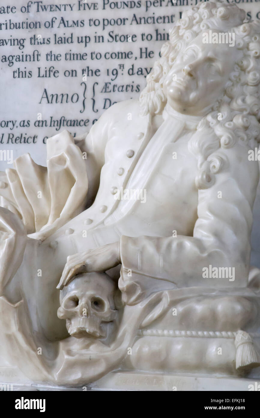 Marble statue of man with skull Stock Photo - Alamy