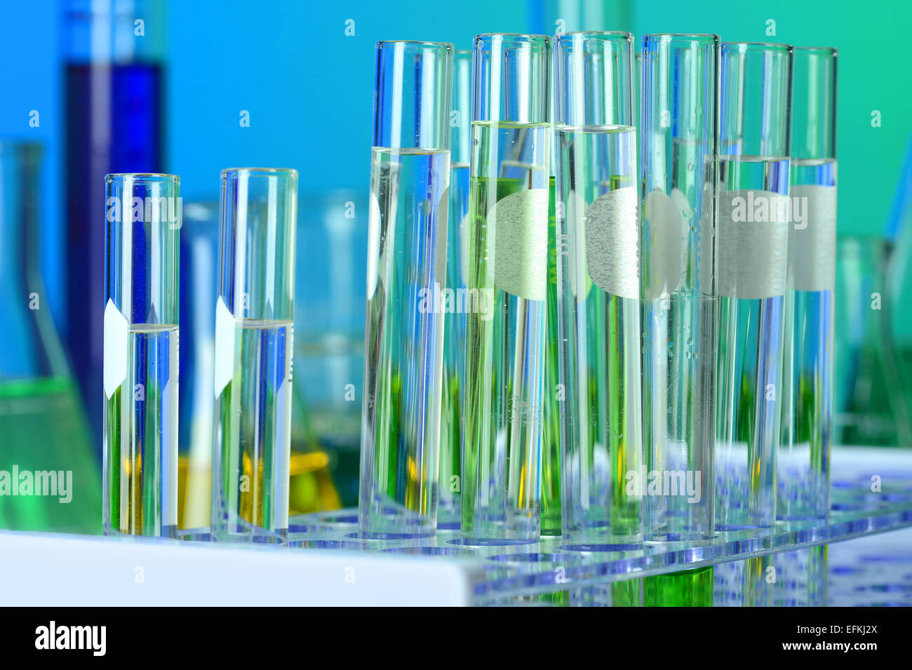 Different test tubes with fluid in laboratory Stock Photo - Alamy
