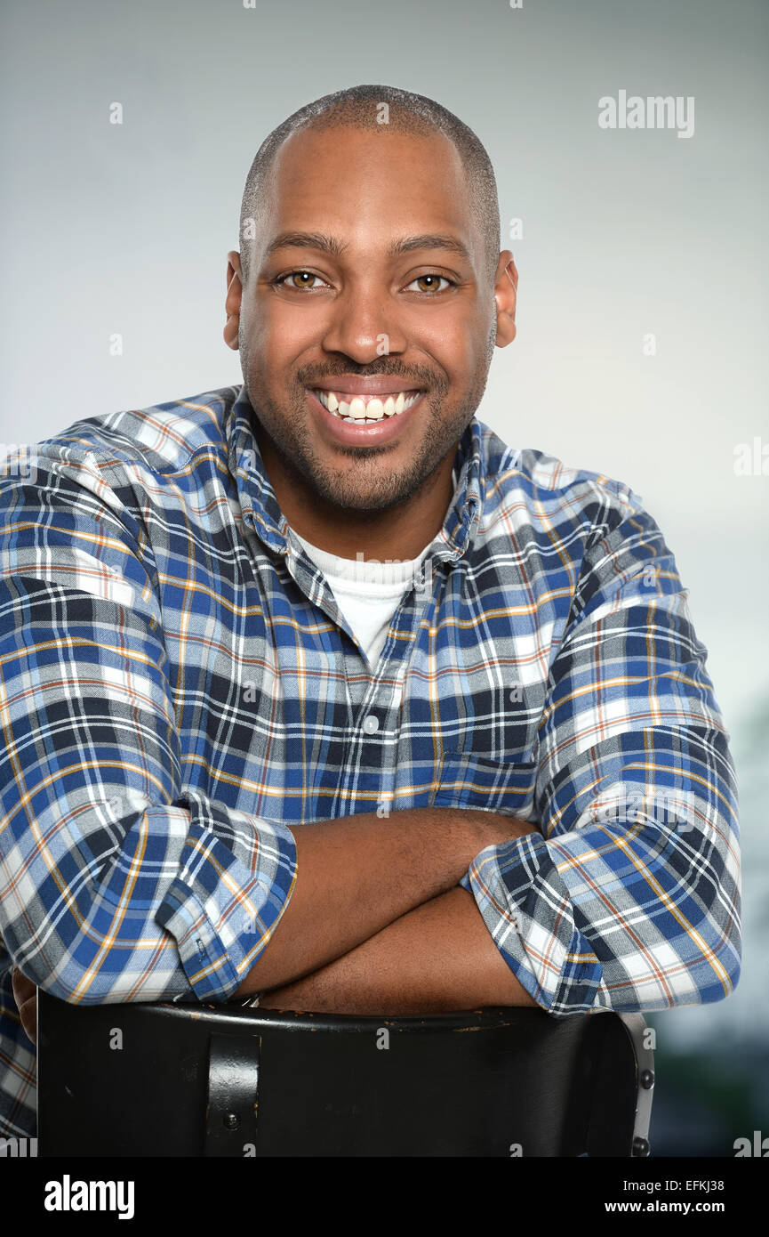African American businessman smiling inside office building Stock Photo ...