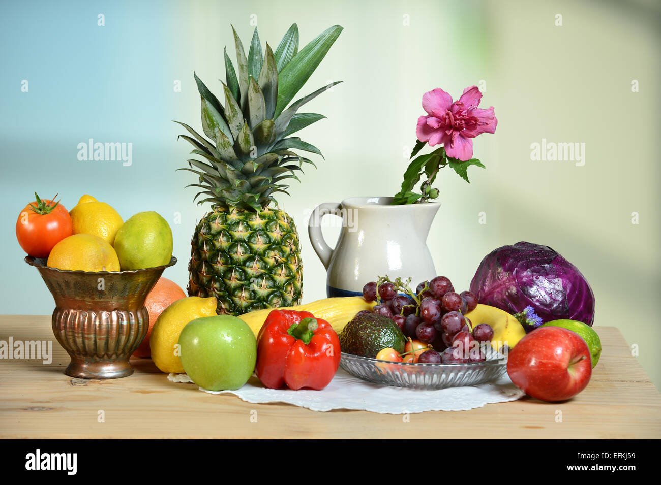 Produce on table with window in background Stock Photo - Alamy