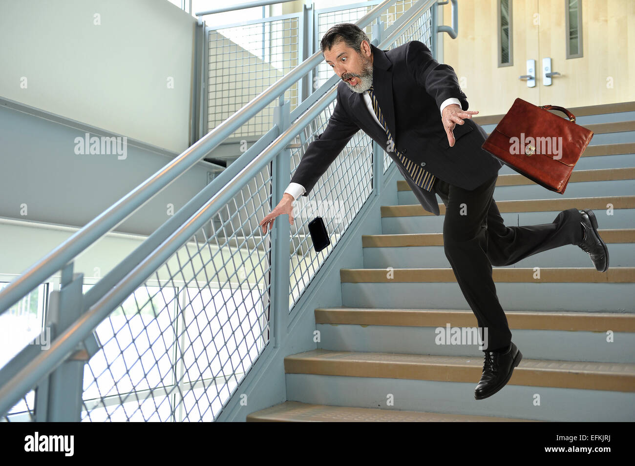 Tripping man falling hi-res stock photography and images - Alamy