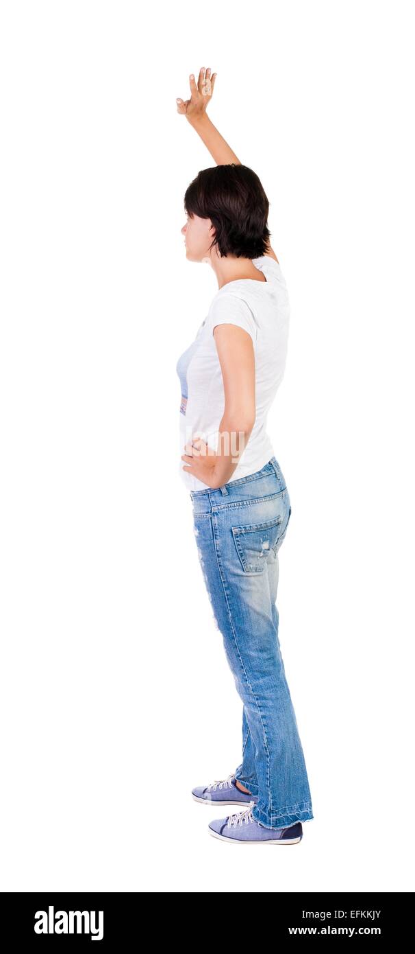 Back view of beautiful woman welcomes. Young teenager girl in jeans ...