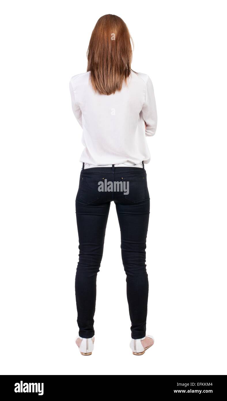 back view of standing young beautiful blonde woman in jeans. girl ...