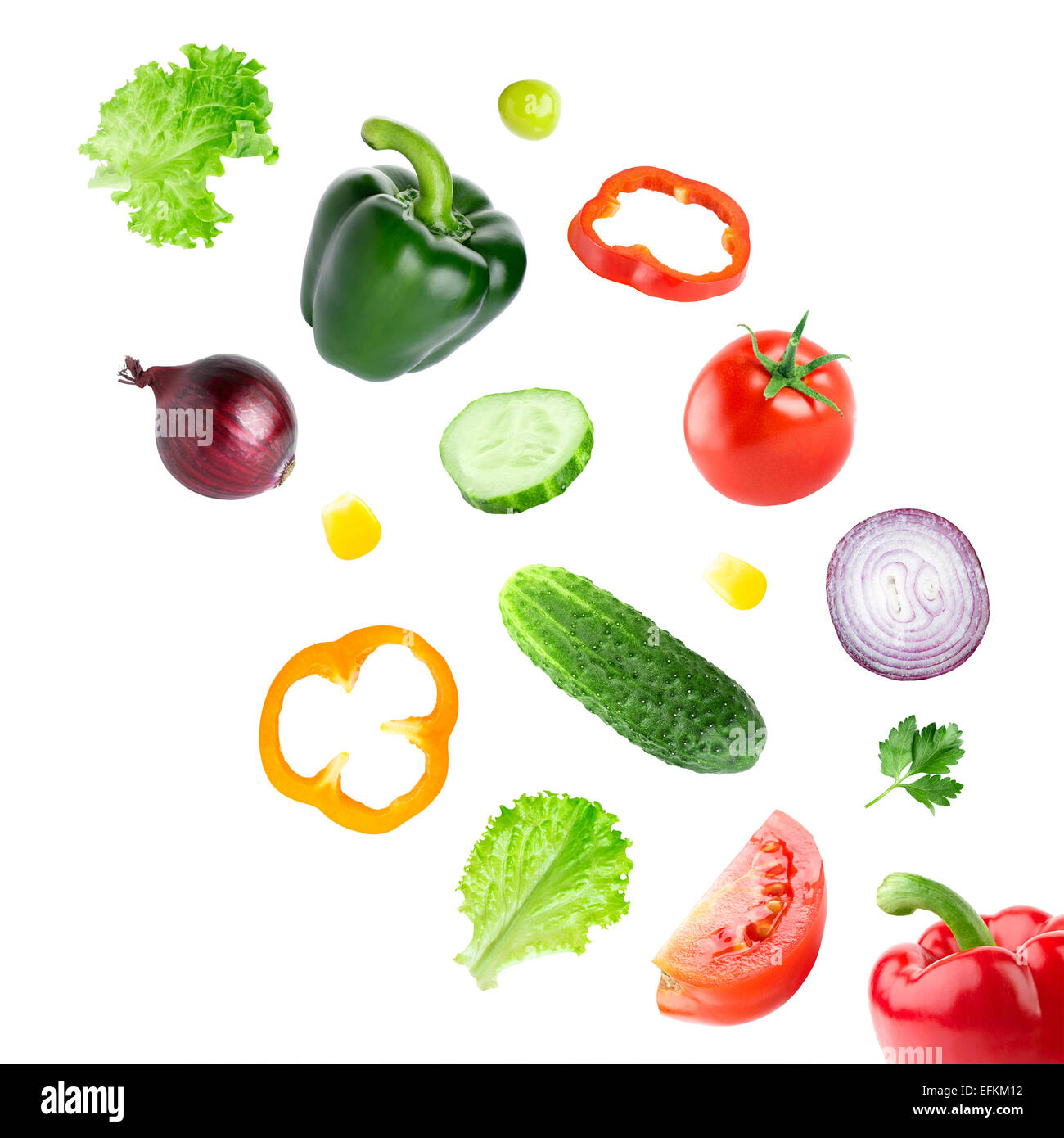 Falling fresh vegetables on white background Stock Photo - Alamy