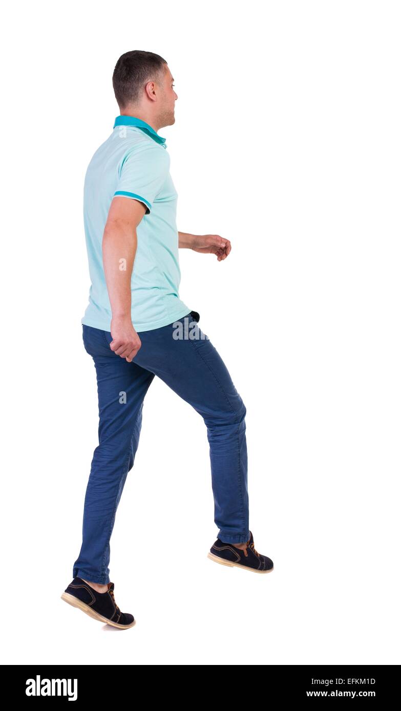 Back view of running man in blue polo. Walking guy in motion. Rear view ...