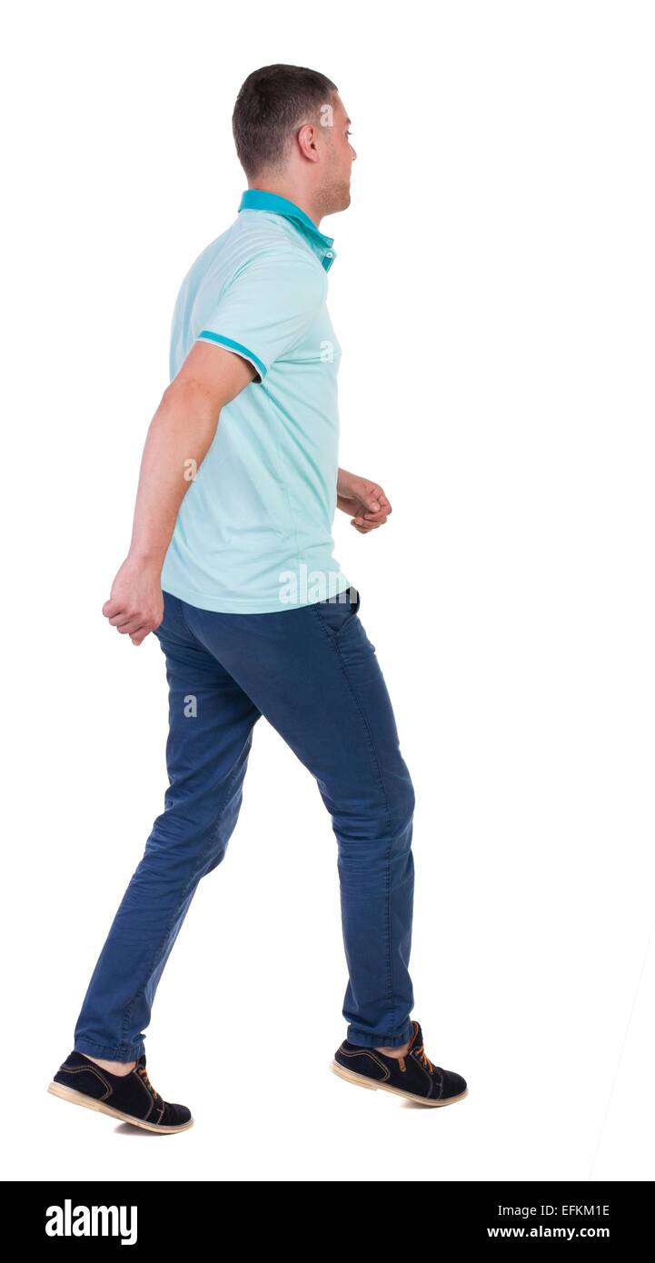 Back view of running man in blue polo. Walking guy in motion. Rear view ...