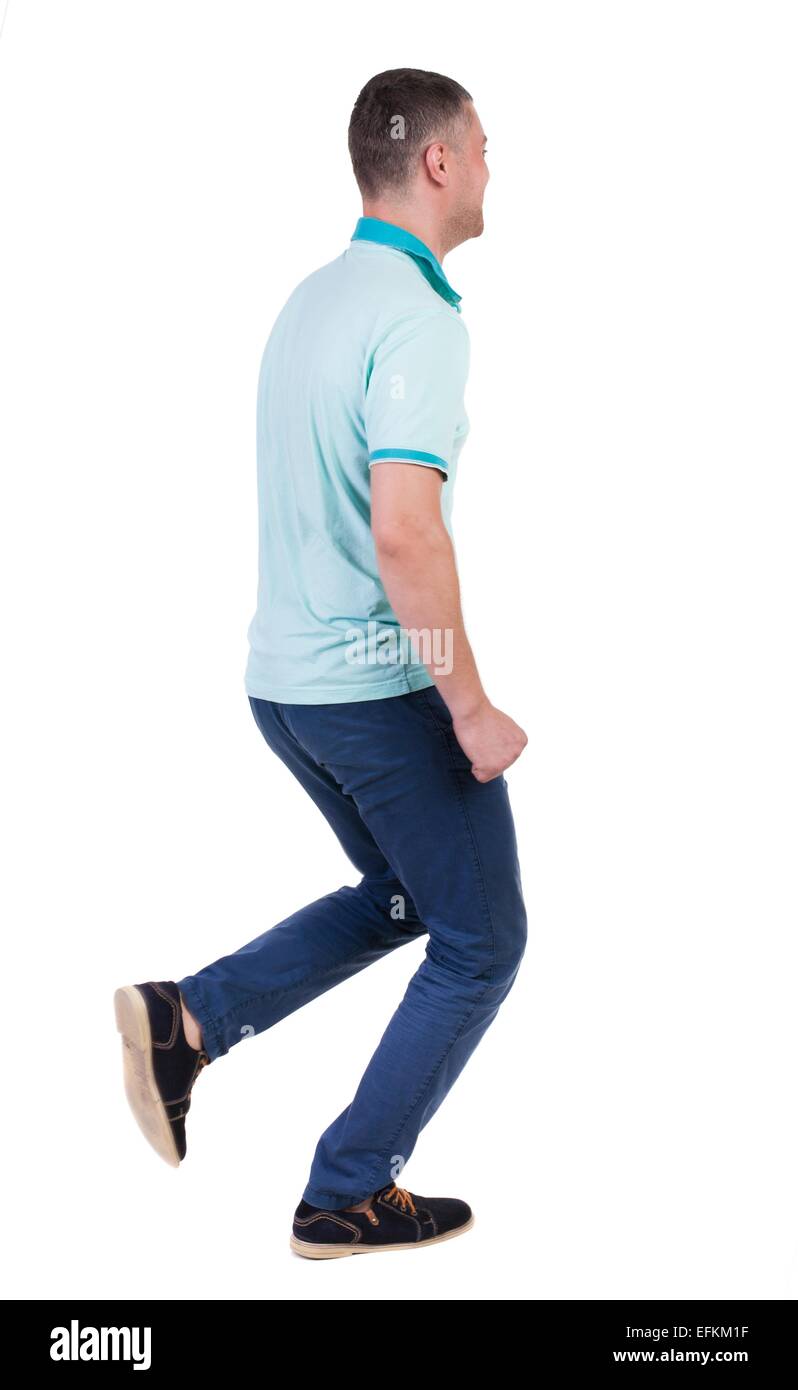Back view of running man in blue polo. Walking guy in motion. Rear view ...