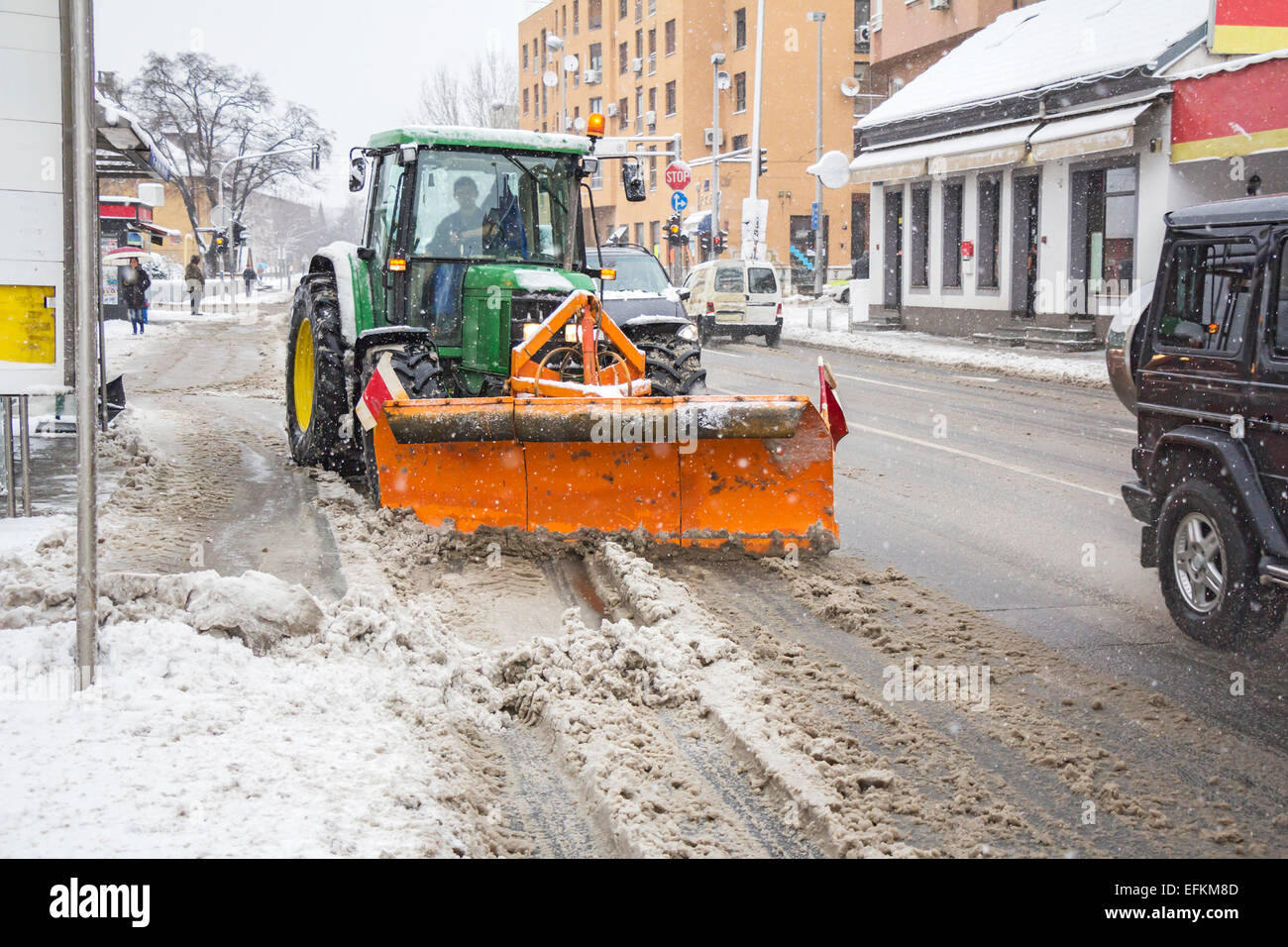 Tractor removing snow hi-res stock photography and images - Alamy