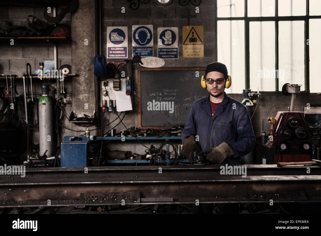 Portrait of welder in workshop Stock Photo - Alamy
