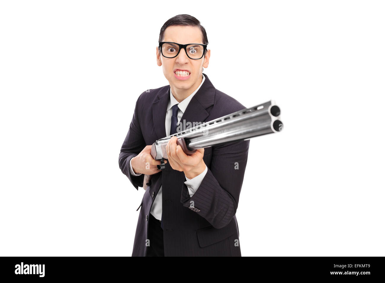 Angry businessman holding a shotgun isolated on white background Stock ...