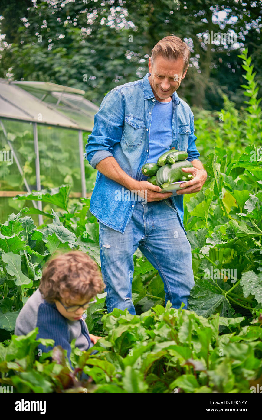 Young man with green hooded top hi-res stock photography and images - Alamy