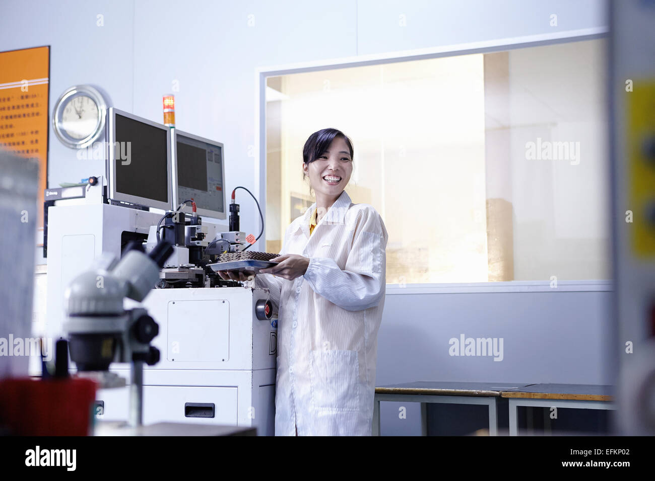 Technician working in LED factory Stock Photo - Alamy