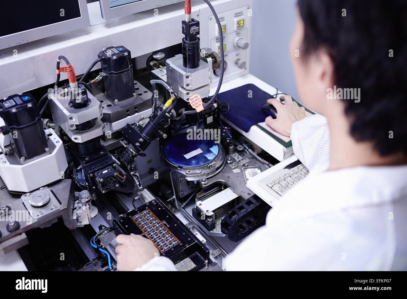Technician working in LED factory Stock Photo - Alamy