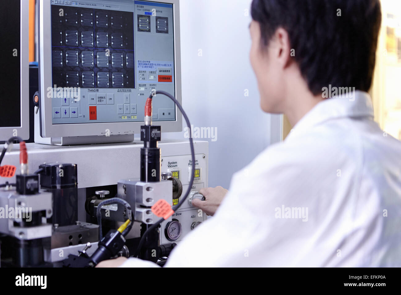 Technician working in LED factory Stock Photo - Alamy