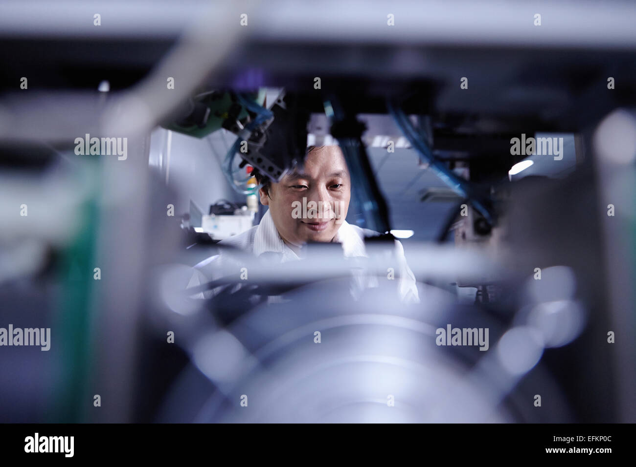 Technician working in LED factory Stock Photo - Alamy