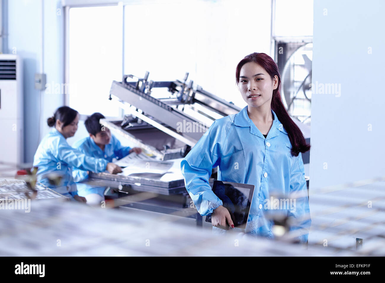 Technician working in LED factory Stock Photo - Alamy