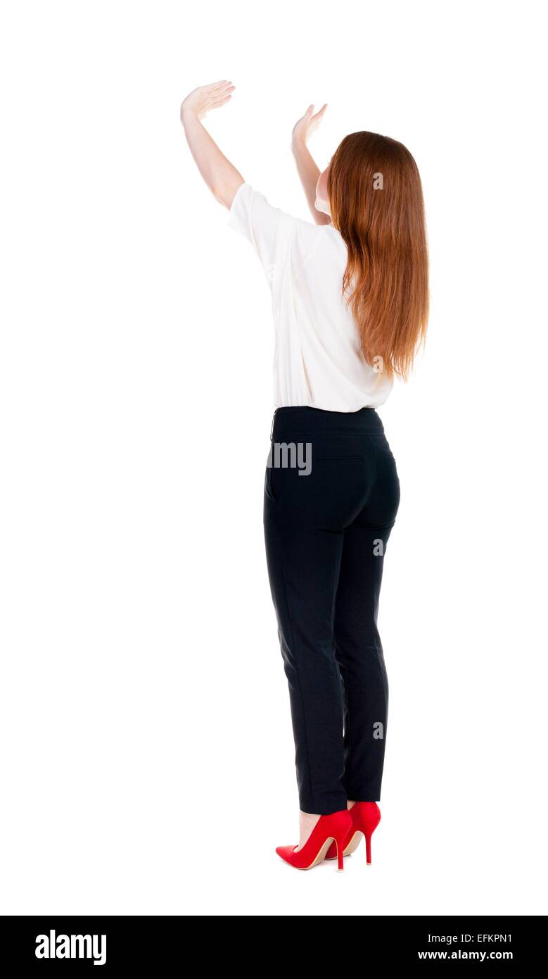 Back view of beautiful business woman welcomes. Young girl in suit ...