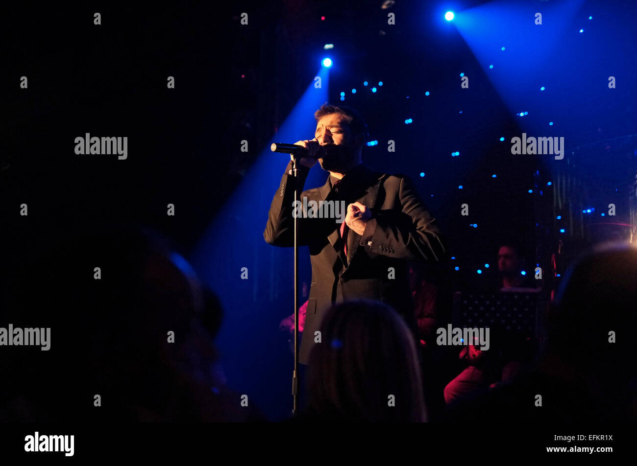 Greek singer performing live during Rebetiko performance occasionally ...