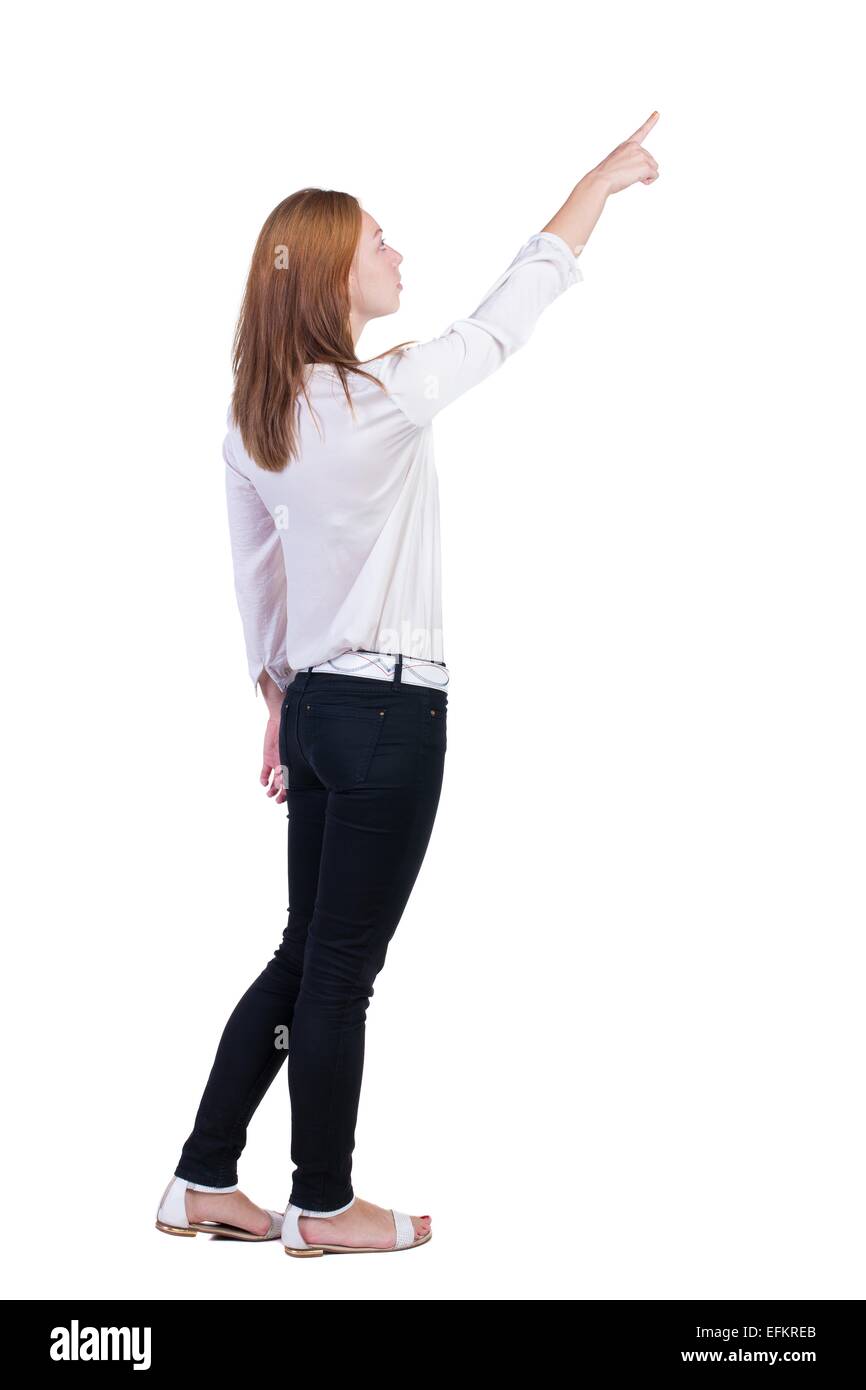 Back view of pointing woman. beautiful blonde girl. Rear view people ...