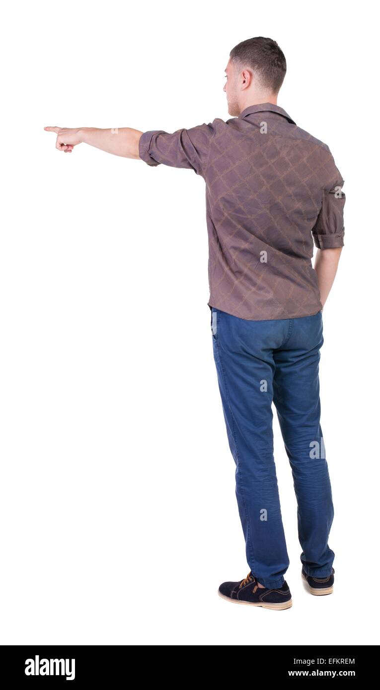 Back view of pointing young men in shirt and jeans. Young guy gesture ...
