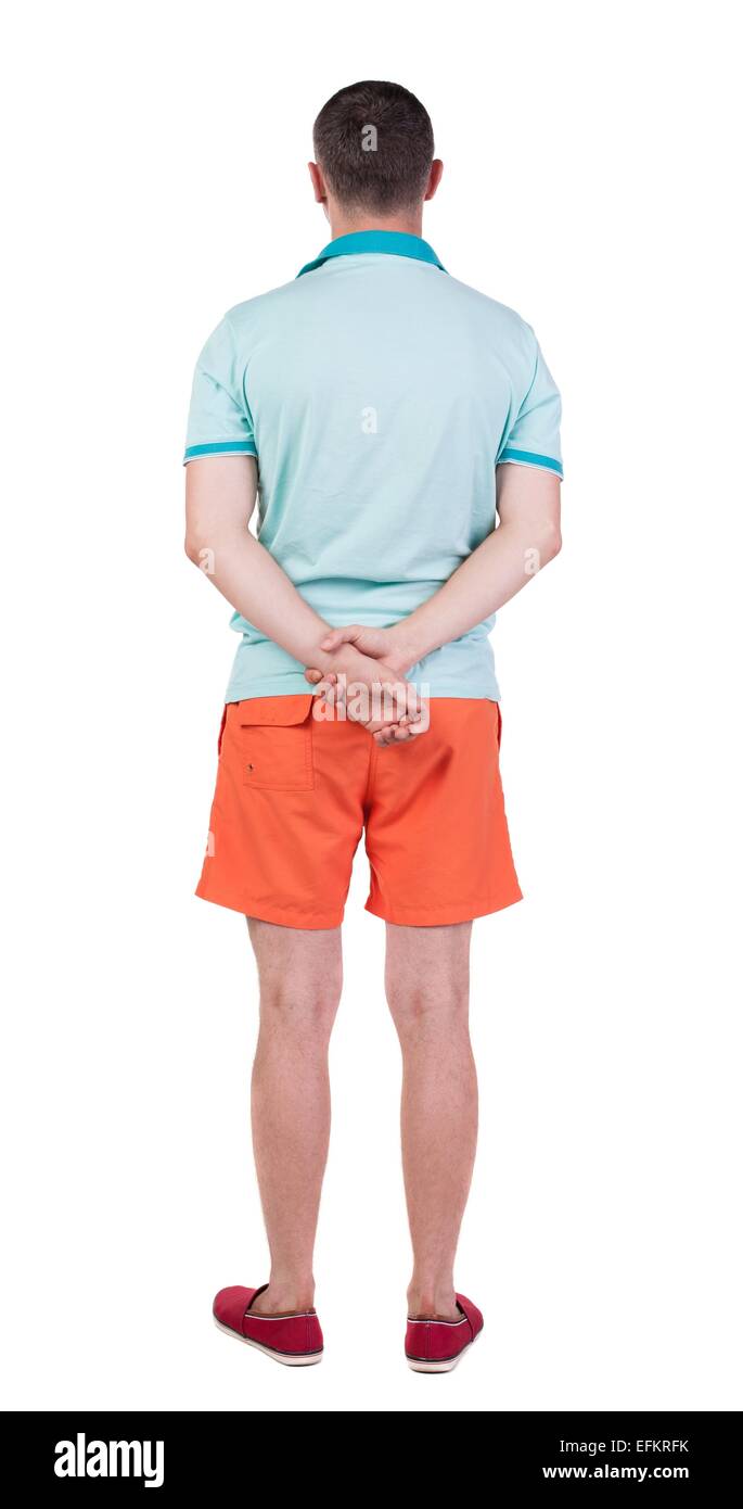 Back view of handsome man in shorts. Rear view people collection ...