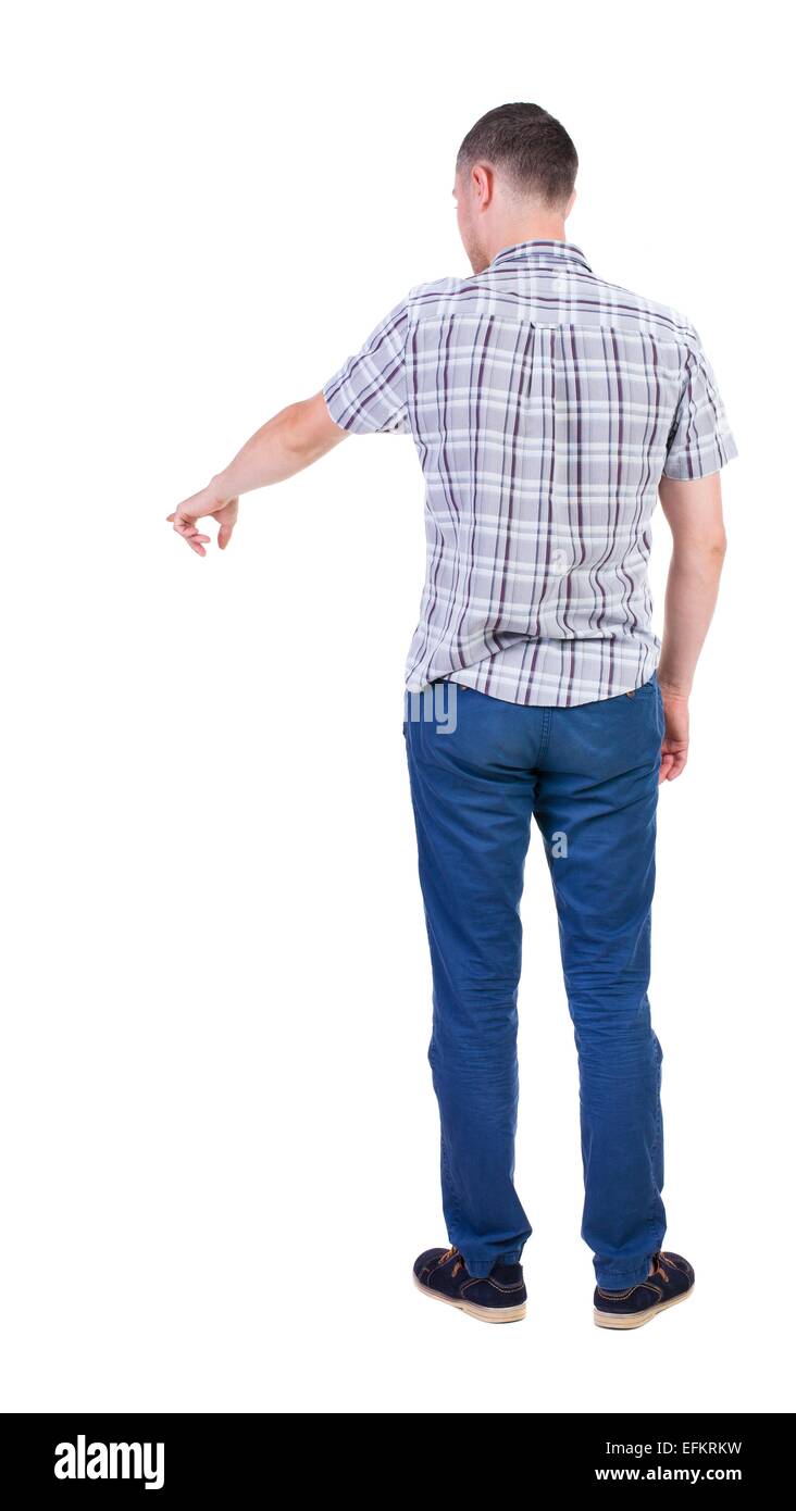 Back view of pointing young men in shirt and jeans. Young guy gesture ...