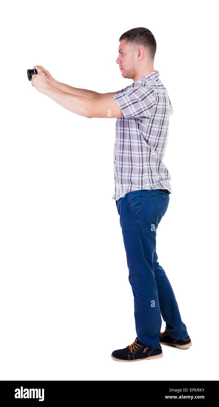 Back view of man photographing. tourist with camera. Rear view people ...