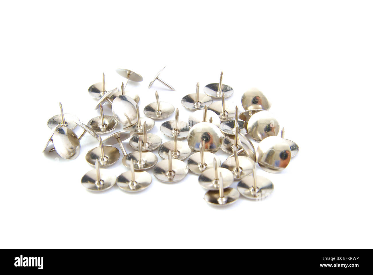 Bunch of thumbtacks on a white background Stock Photo - Alamy
