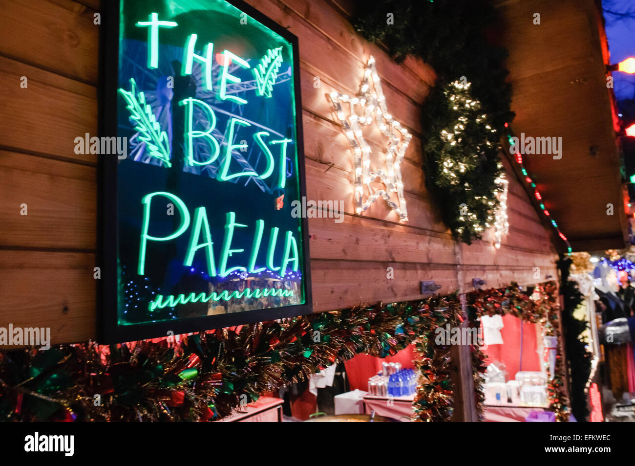 Sign on a market stall advertising "The Best Paella Stock Photo - Alamy