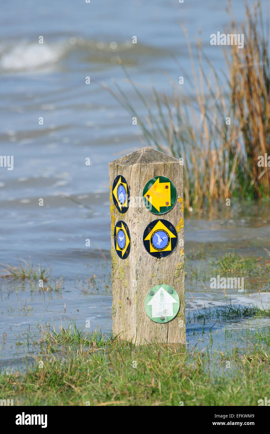 High tide floods the marked footpath on the Isle of Anglesey Coastal ...
