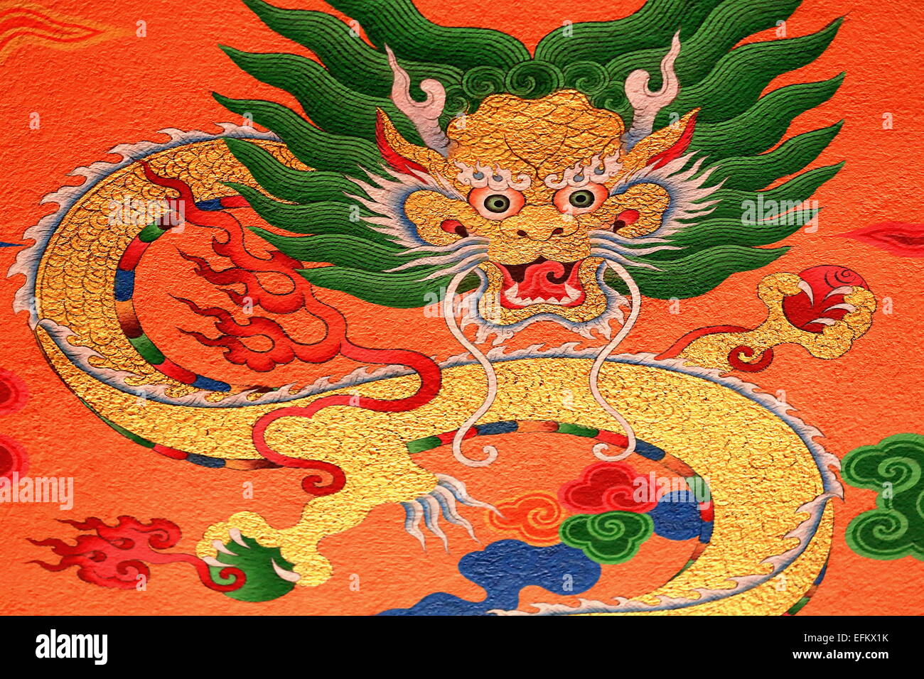 Buddhist drawing-decoration on tan color painted wall showing ...