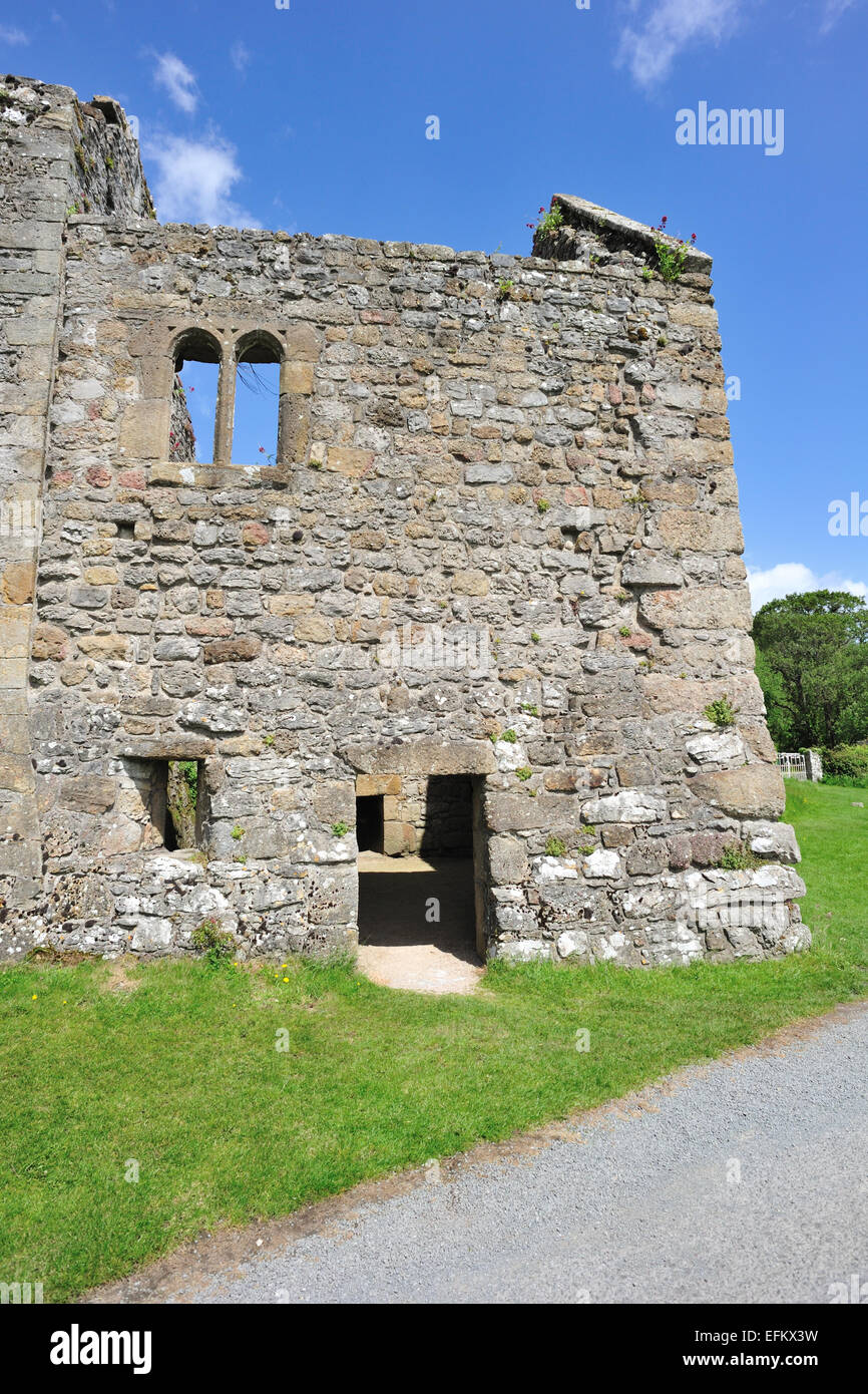 Penmon Priory complex under blue sky and sunshine, Anglesey, Wales, UK ...
