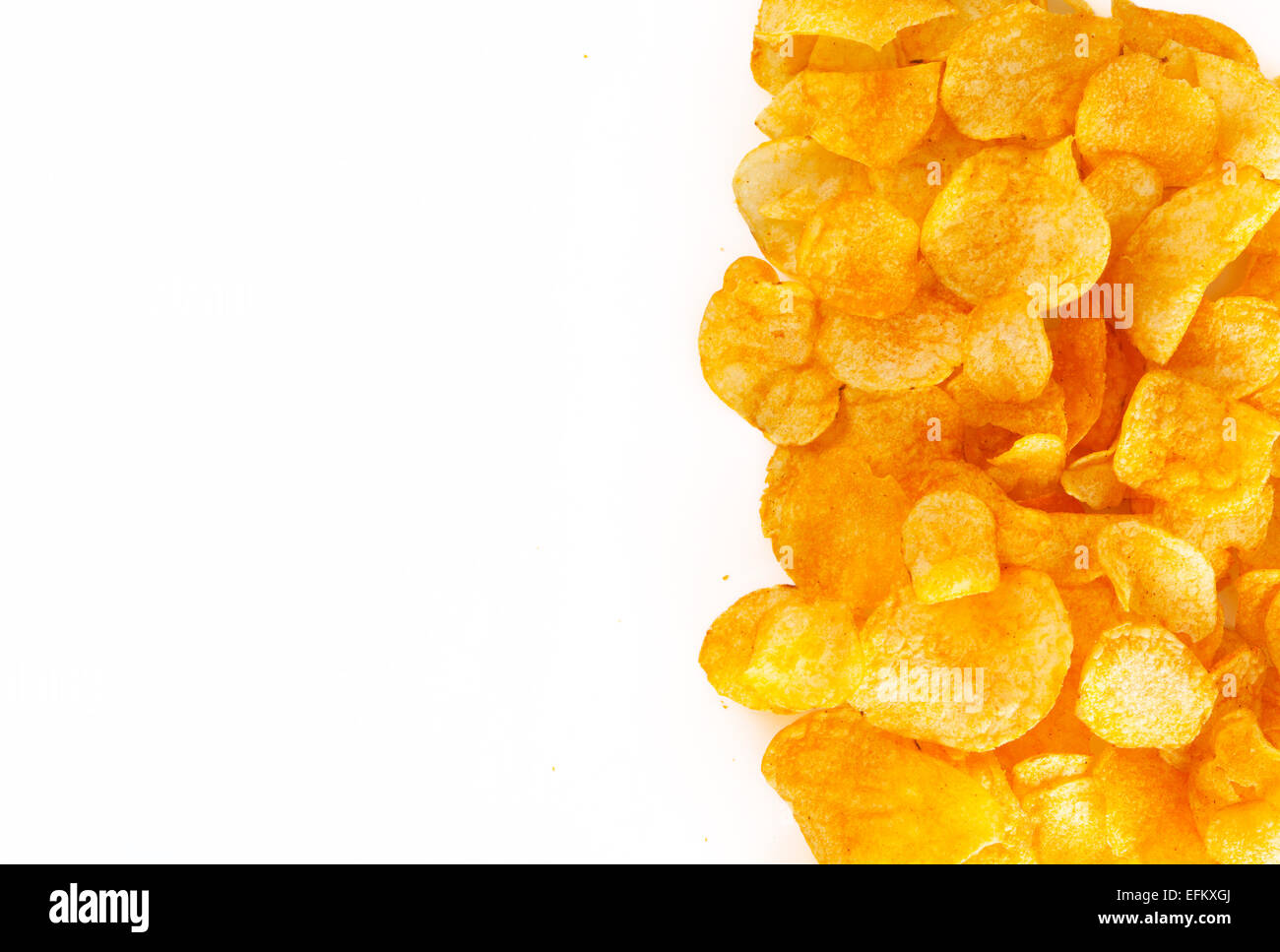 many potato chips with text space on a white background Stock Photo - Alamy