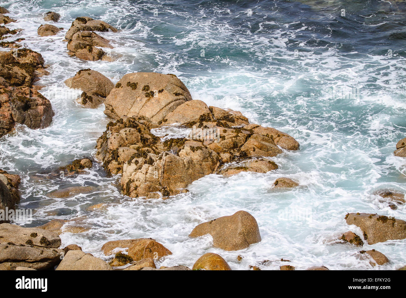 Ocean waves splashing against coastal rocks, Isles of Scilly, UK Stock ...