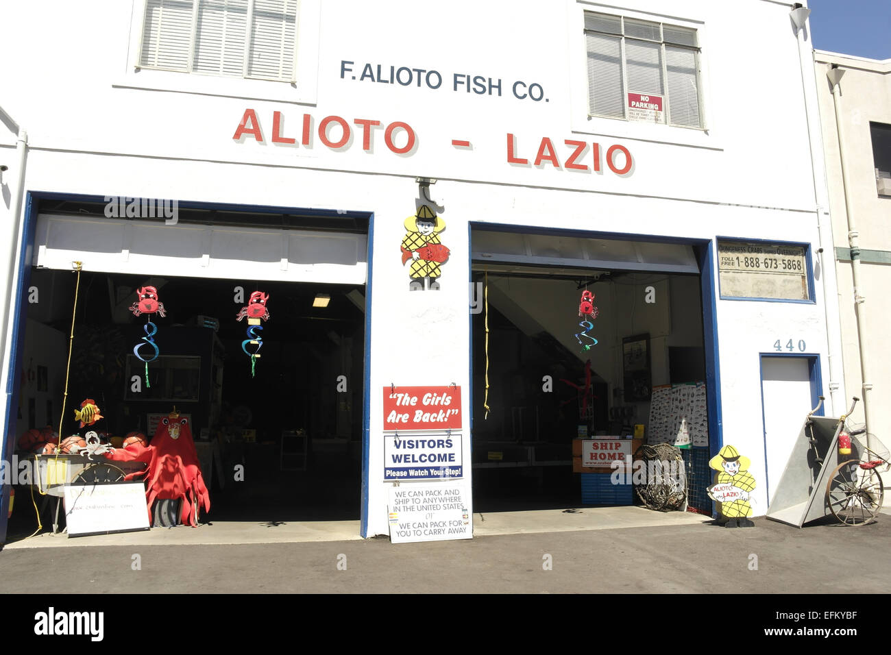 Sunny view white painted building, with open entrances, model crabs ...