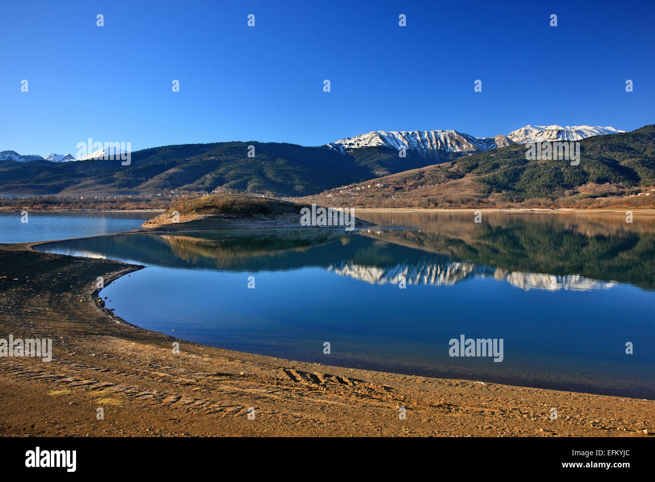 Partial view of Plastiras lake. In the background Agrafa mountains ...