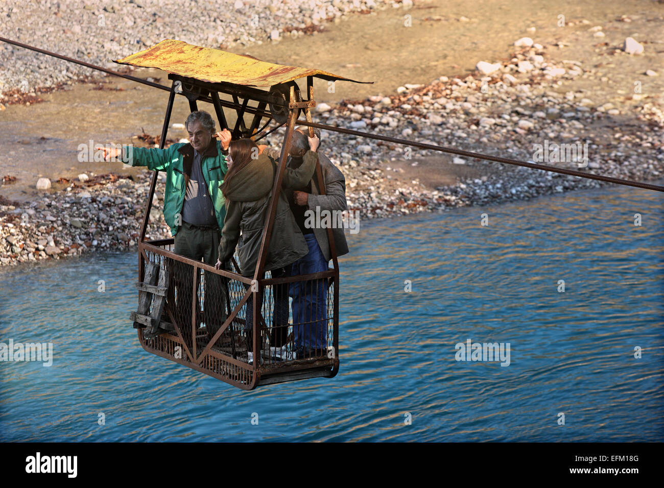 Crossing Acheloos river with the "perataria" that connects Karditsa ...
