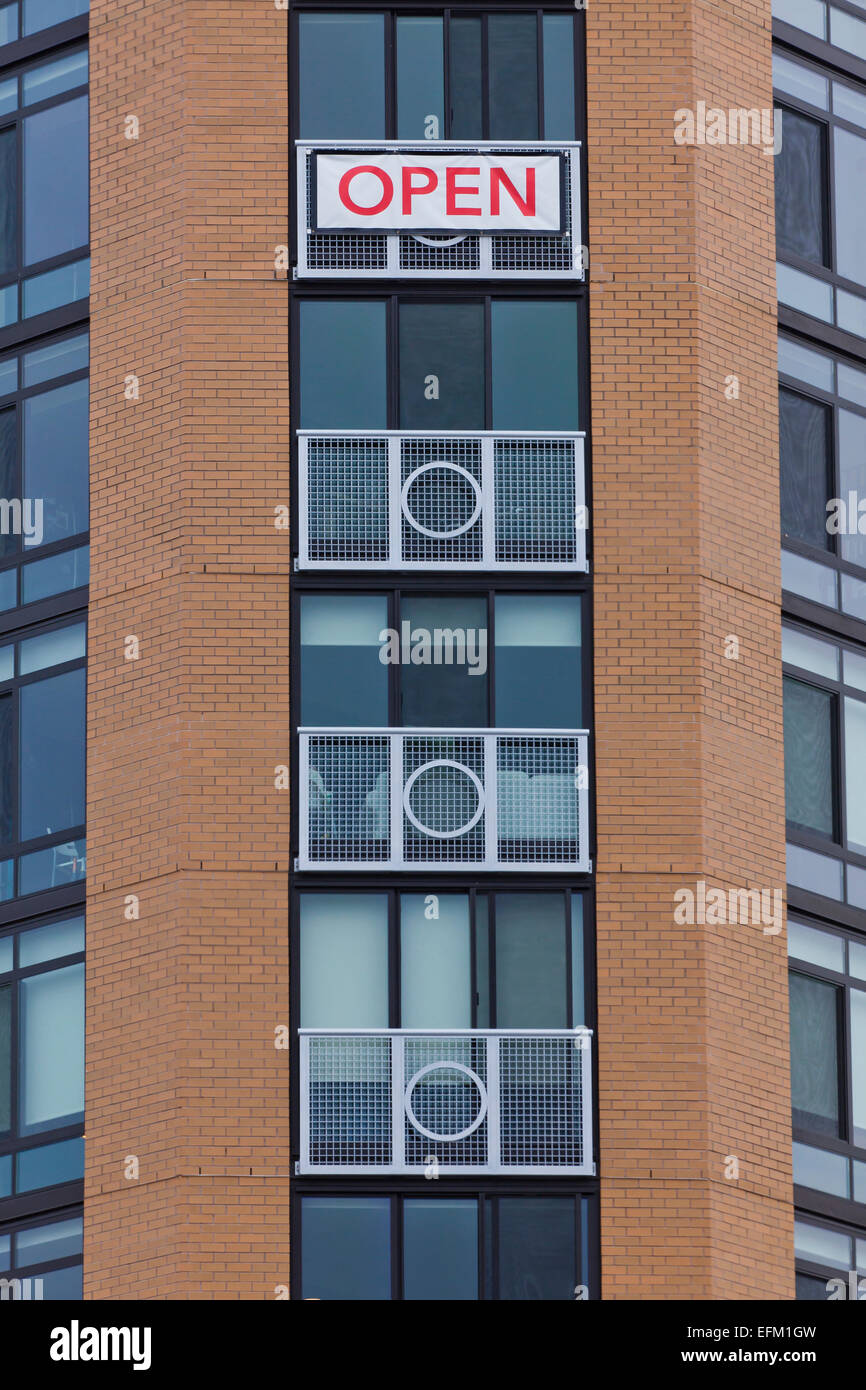 Open sign on new highrise condominium building - Arlington, Virginia ...