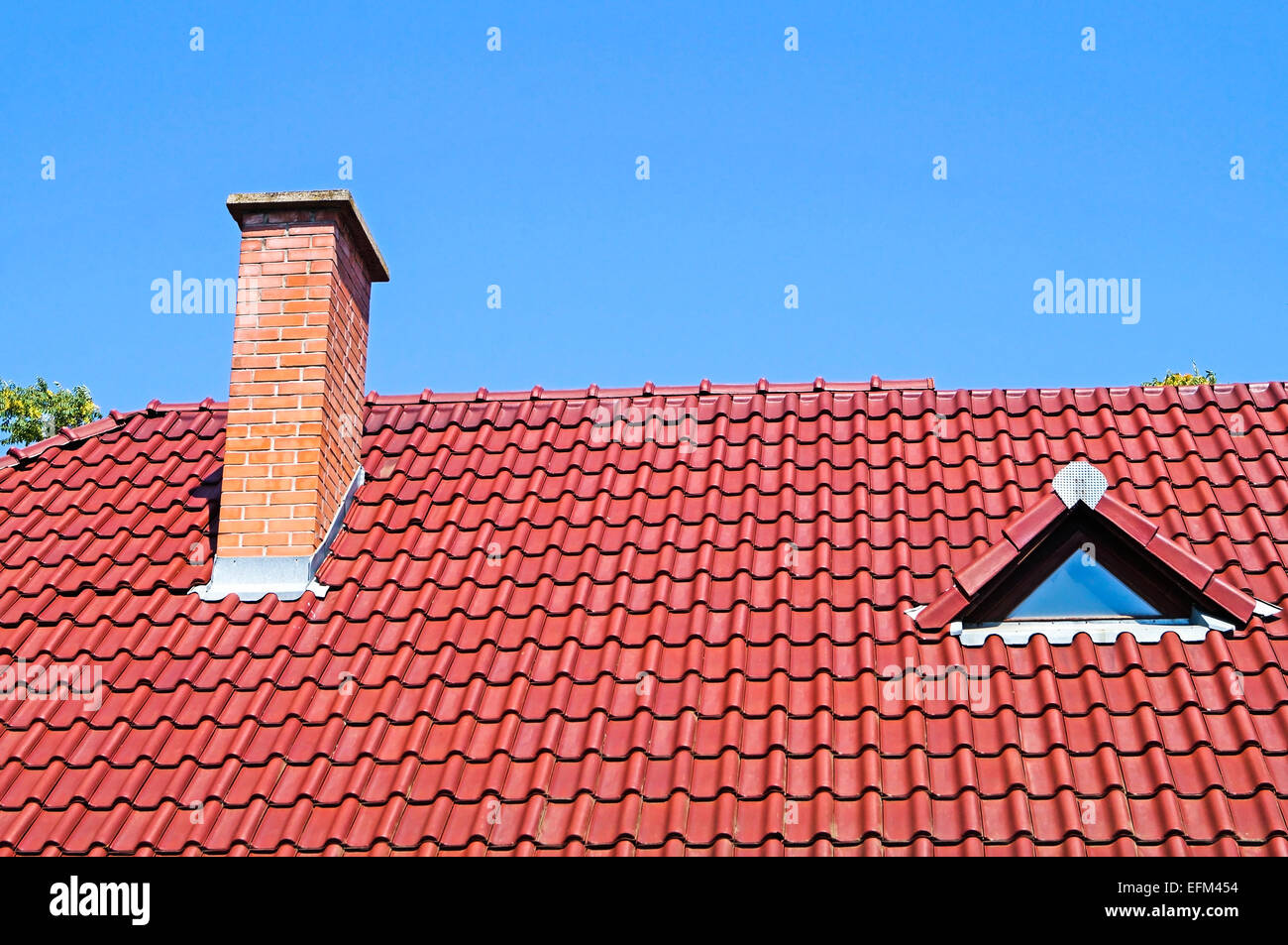 House roof with smoke stack and window Stock Photo - Alamy