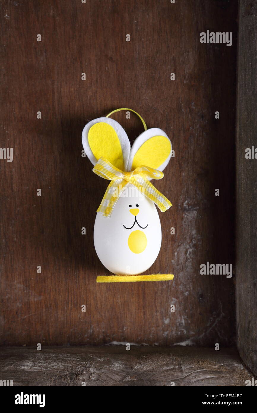 Yellow hare on a black background, decor Stock Photo - Alamy
