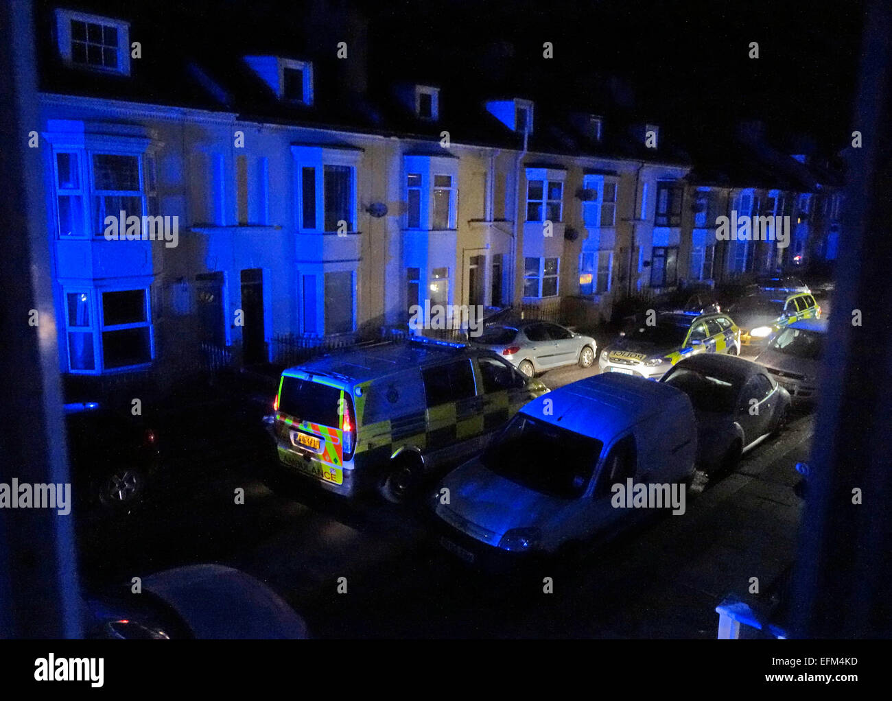 Police cars and ambulances attending the scene of a crime in East ...