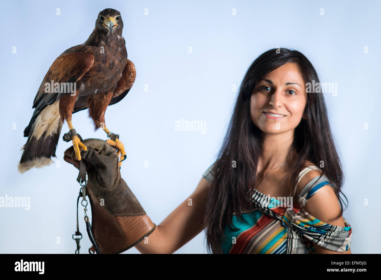 Woman and buzzard Stock Photo - Alamy