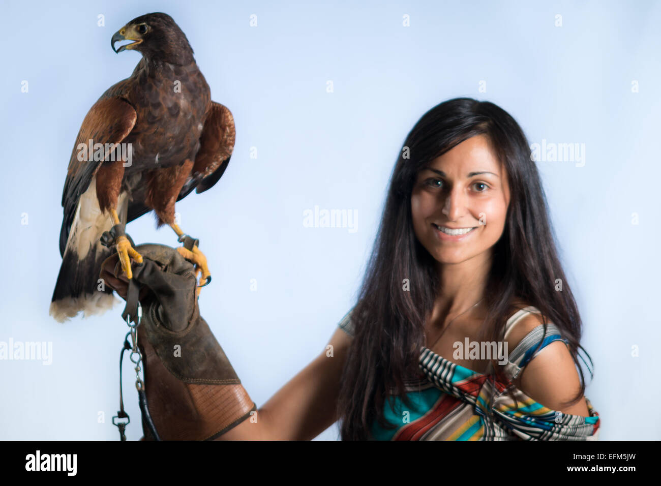 Woman and buzzard Stock Photo - Alamy