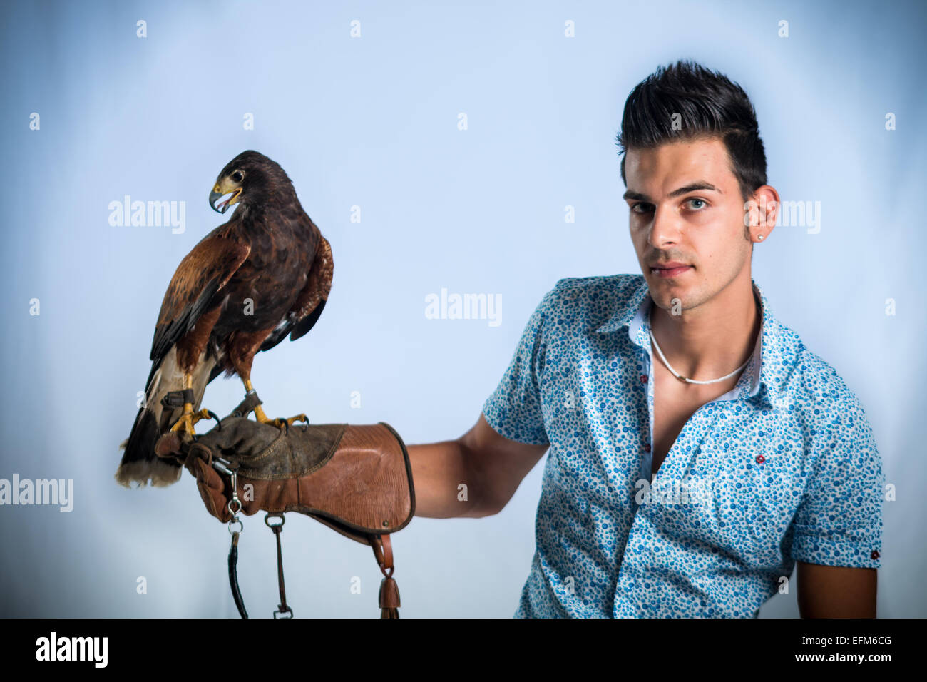 man and buzzanrd Stock Photo - Alamy