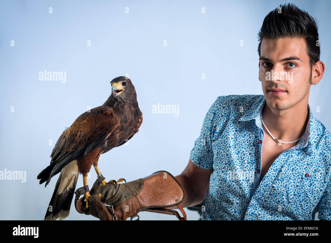 man and buzzanrd Stock Photo - Alamy