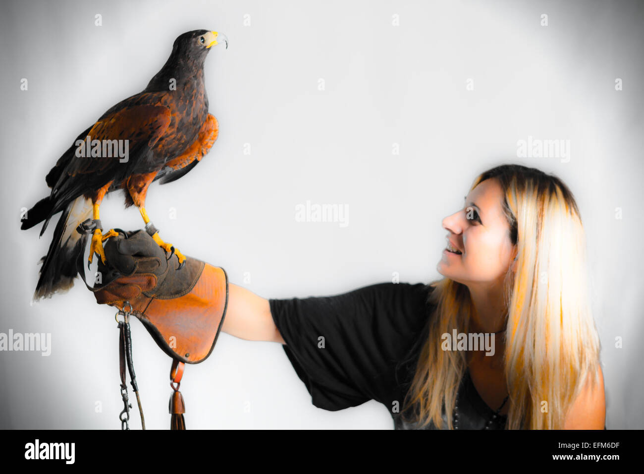 Woman and buzzard Stock Photo - Alamy