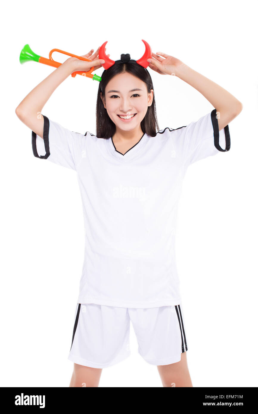 uniformed cheerleader a pose with a megaphone isolated on white Stock ...