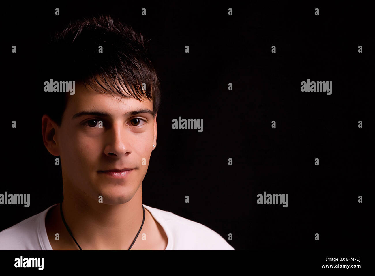 Young boy portrait - low key portrait Stock Photo - Alamy
