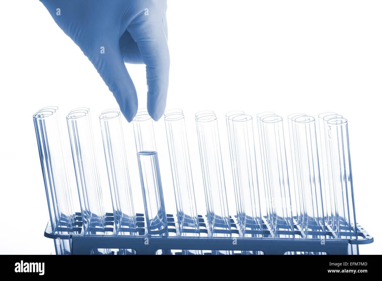 Closeup of glass test tubes on a white background. Toned image Stock ...