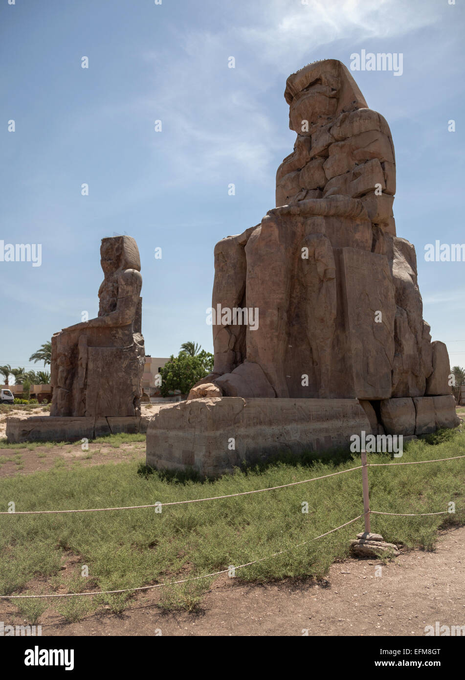 The Colossi of Memnon - two massive stone statues of Pharaoh Amenhotep ...